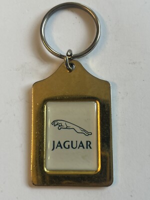 VINTAGE🇺🇸LEAPING”JAGUAR”WHITE DEALERSHIP CAR KEYCHAIN “ RAY CATENA ...