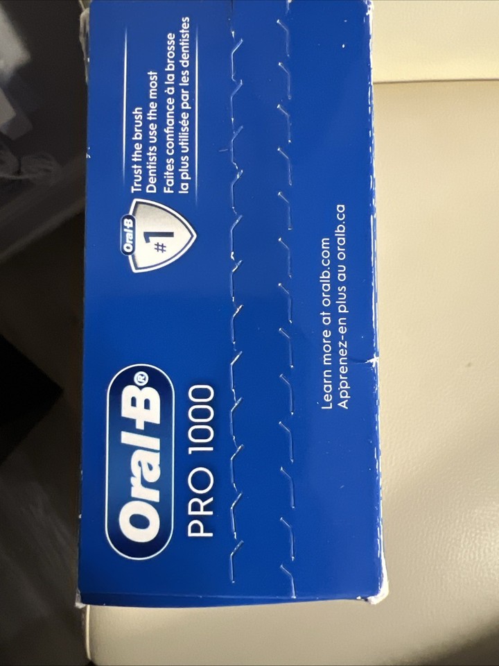 Oral-B Pro 1000 Crossaction Electric Rechargeable Toothbrush - Black ...