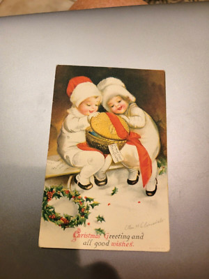Christmas Children Opening Gift Basket Ellen Clapsaddle Postcard Posted ...