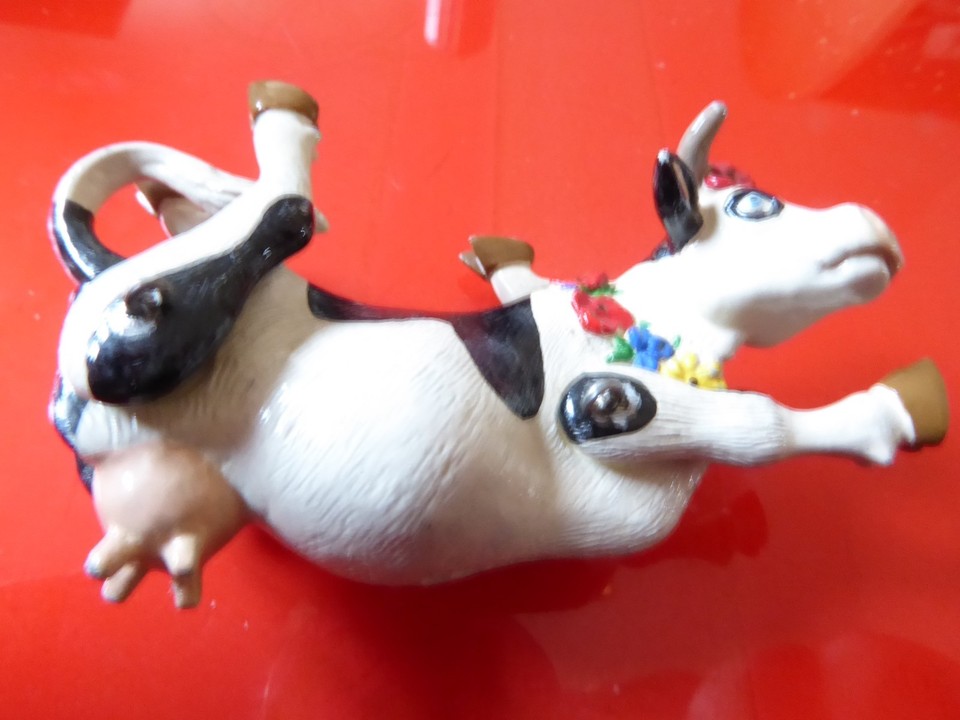 Cold painted bronze, articulated cow, that doubles as a contortionist ...