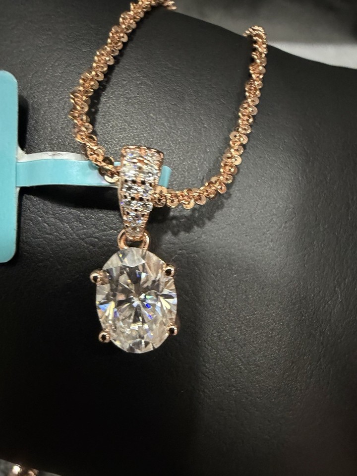 1.5 CTW VVSD Oval Cut Moissanite Pendant With Rose Gold Twisted Rock ...