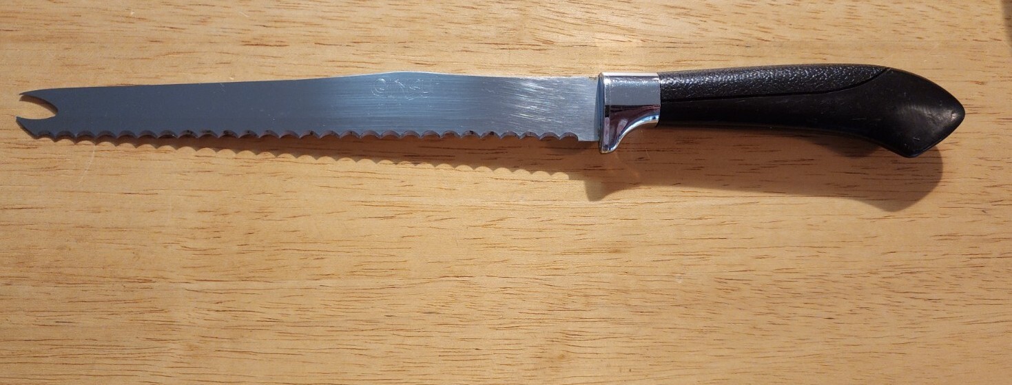 #110) Vintage Ginsu Serrated Carving Knife Black Handle | eBay