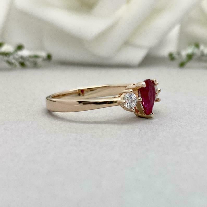 1ct Engagement Ring Pear Ruby Simulated Diamond Accent Trilogy 14k Gold ...