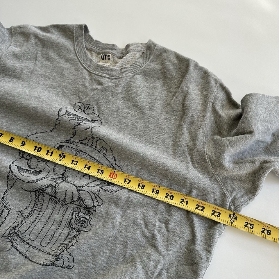 KAWS x Uniqlo x Sesame Street Companion Trash Can Outline Sweatshirt ...