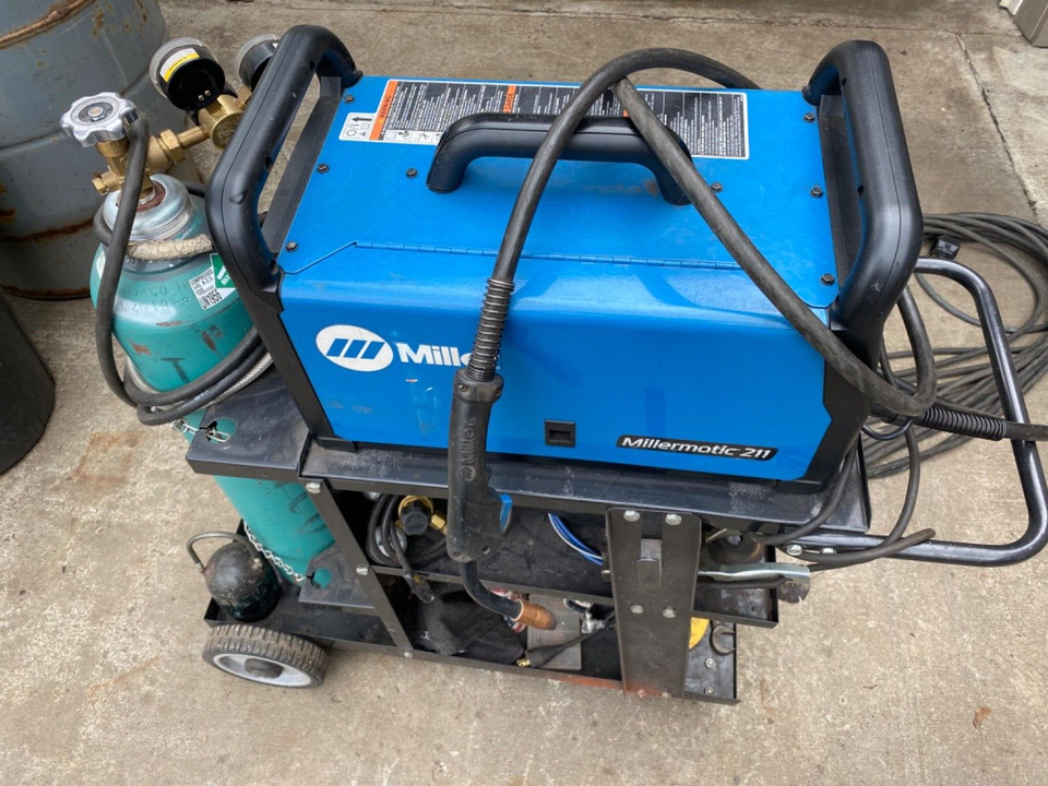 Millermatic 211 mig welder Miller 110v/240v with rolling cart and 25/75 ...