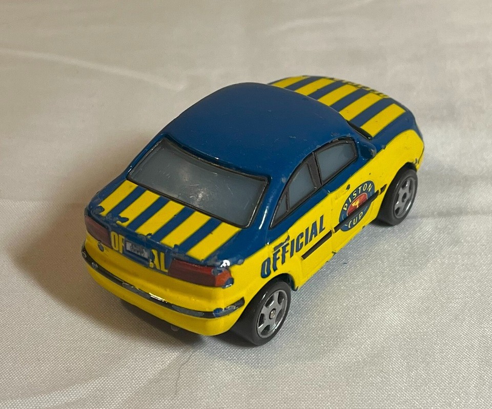 Disney Pixar Cars Diecast Vehicle -Piston Cup Official Tom with ...
