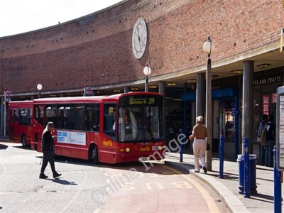 Photo 6x4 Southgate Bus Station Southgate/TQ3094 A passenger hurries to ...