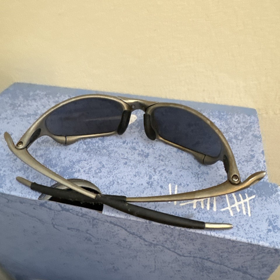 Oakley Juliet Plasma Frame w/ Ice Iridium Lenses. Has serial number plz ...