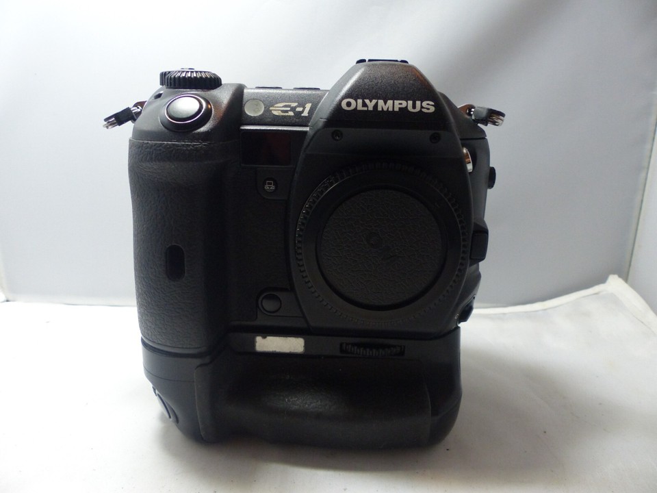 Olympus E1 With Zuiko 70-300mm zoom. Comes with the grip. Shutter count ...