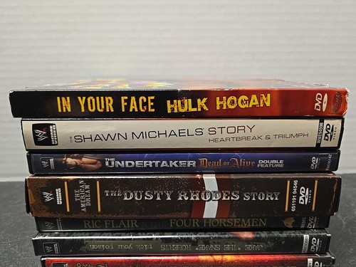 WWE DVD Lot Of 7 Hulk Hogan Undertaker Ric Flair Jake the Snake Dusty ...