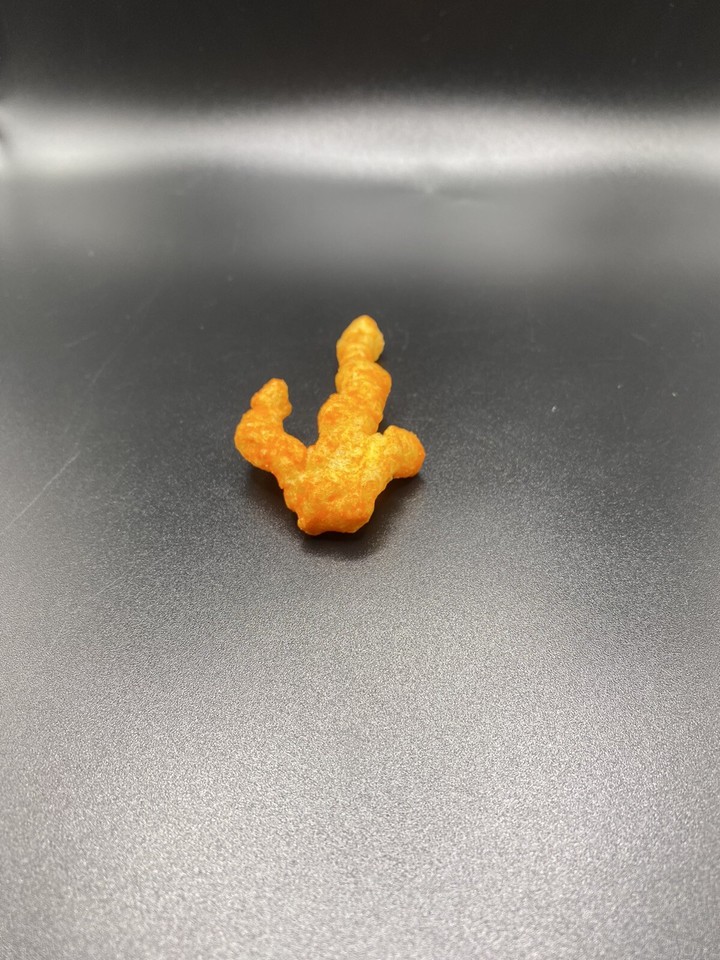 Crunchy Cheeto shaped like a ship’s Anchor or Arrow. | eBay