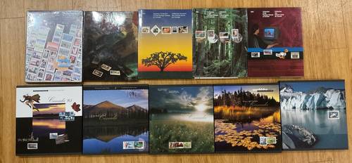 Canada year books x 10. A few stamps in 1999. No stamps in others. NB2 ...
