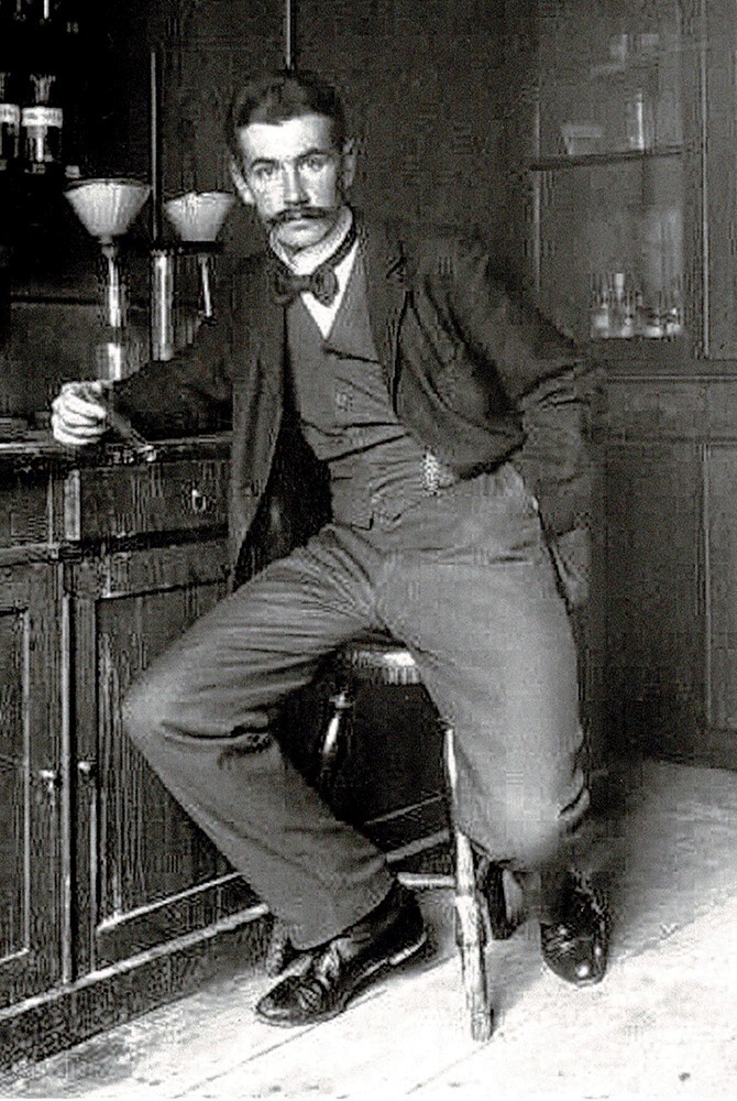 Victorian era man with cigar sitting in a bar gentleman's collection ...