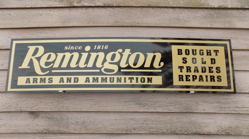 EARLY STYLE REMINGTON FIREARMS DEALER SIGN/AD 1'X46" ALUM. PANEL W ...