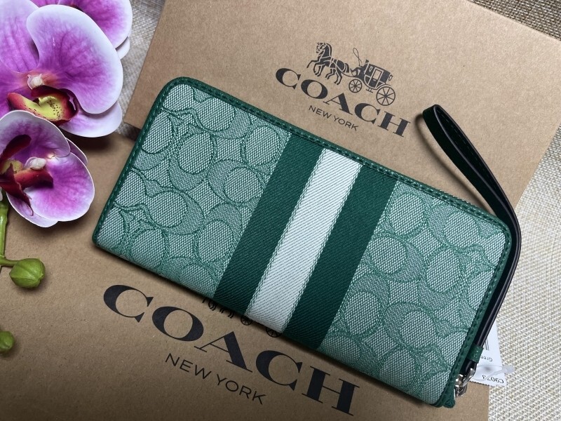 Teal Coach Signature Wallets