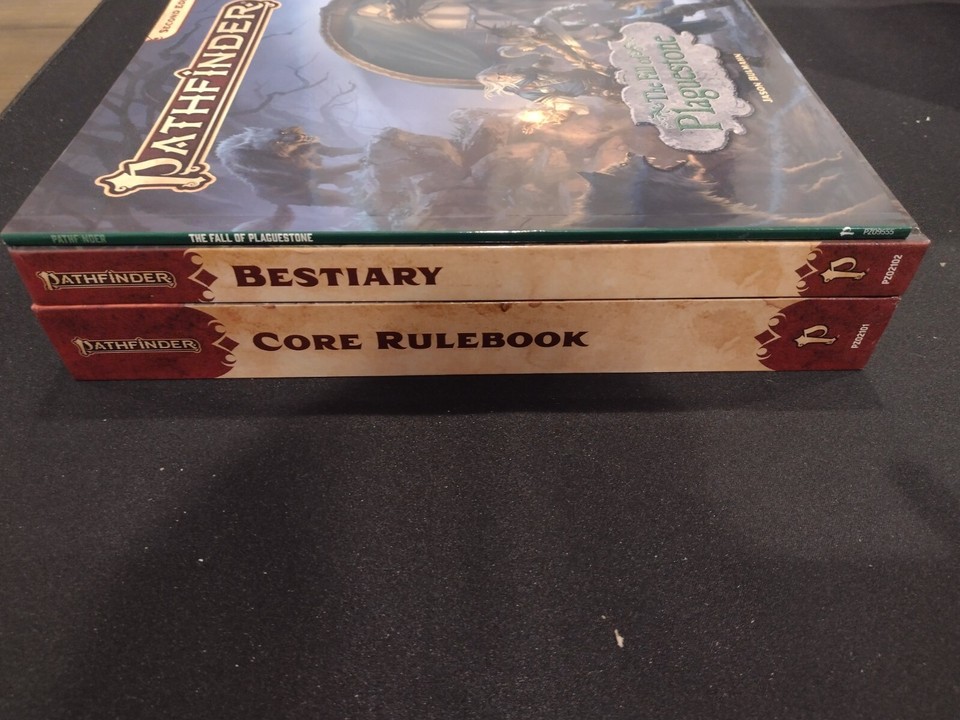 Pathfinder core hard cover rule book and Bestiary with fall of ...