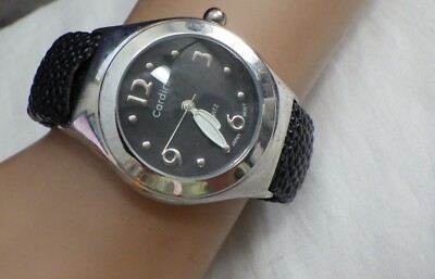 CARDINI WATCH WITH BLACK TEXTURED BAND UNUSED , WILL NEED NEW BATTERY ...
