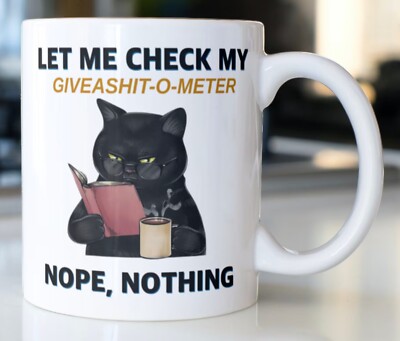 Funny Cat drinking Coffee mug stating “Let me check my Give-o-shit ...