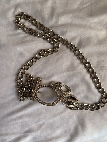 BEBE …RHINESTONE SILVER CHAIN BELT…ONE SIZE.35 INCHES LONG…..MISSING ...