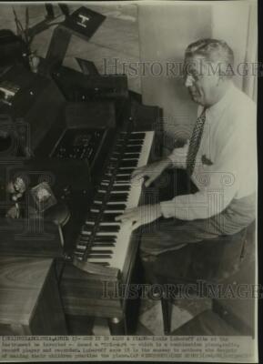 1949 Press Photo Louis Luberoff sits with his invented instrument Trio ...