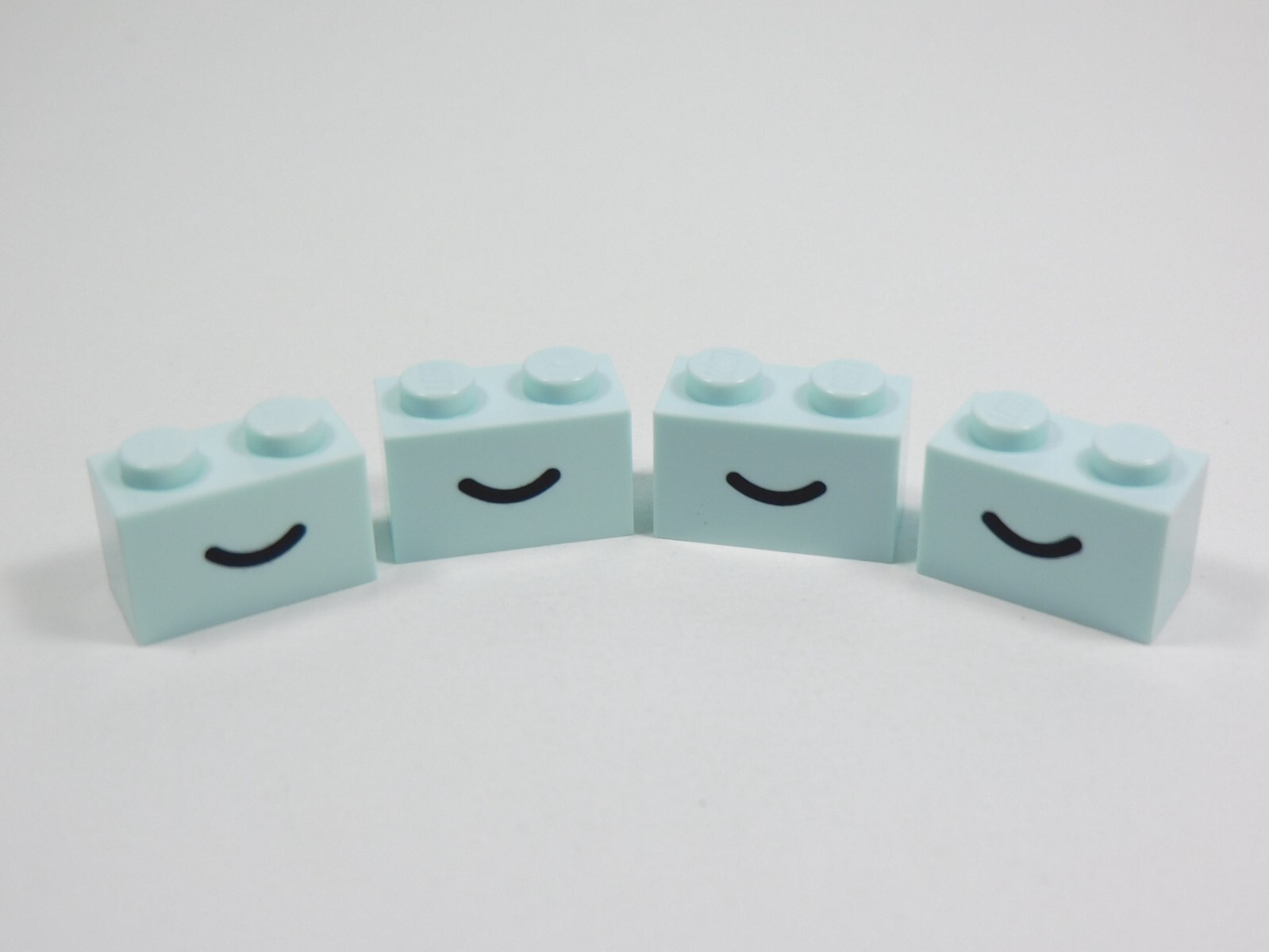 LEGO Lot of 4 Aqua Blue 1x2 Printed bricks w/ Smile N7 | eBay