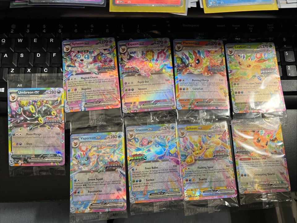 9 Prismatic Evolutions Surprise Box Sealed Stamped EX Promo Cards ...