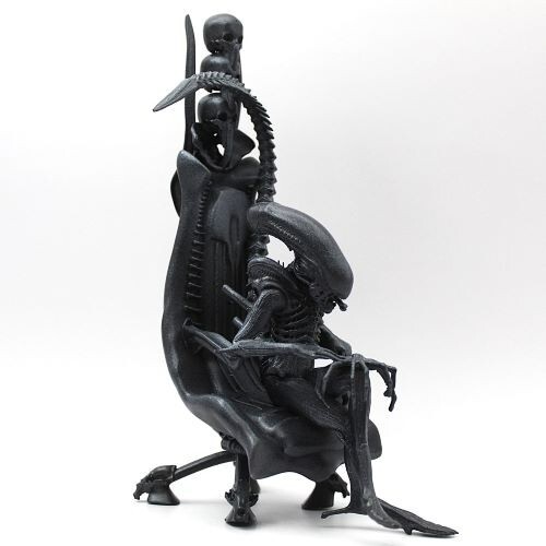 Alien Warrior in an HR Giger Chair Stroking a Facehugger Desk Art ...