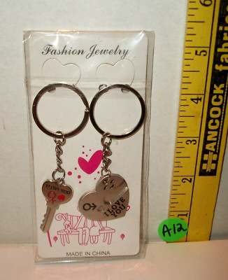 NEW I LOVE YOU KEYCHAIN SET KEY ONE HAS A KEY THAT FITS INTO OTHERS ...