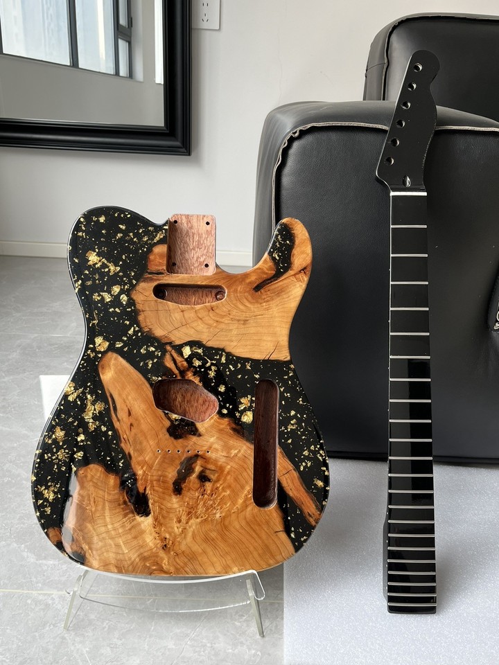 mahogany electric guitar body is surface with an epoxy resin luster ...