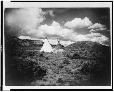 Two Apache Indian teepees,hilly landscape,tipis,plains,clouds,Arizona ...