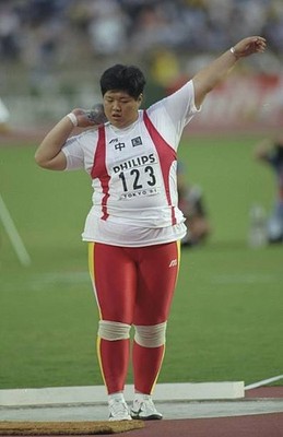 Huang Zhihong of China in action at the Shot Put event at the Wor 1991 ...