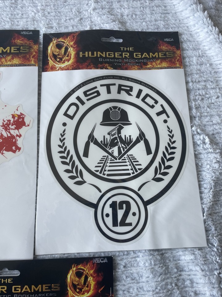 Hunger Games Burning Mockingjay District 12 Vinyl Decal & Bookmarks ...