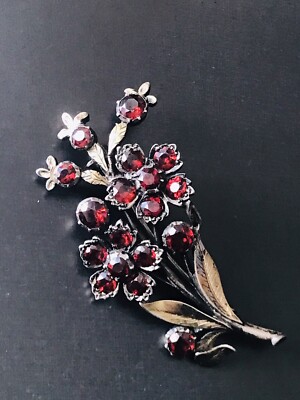 Sybil Dunlop, London 1957 silver and garnet brooch, of floral spray ...