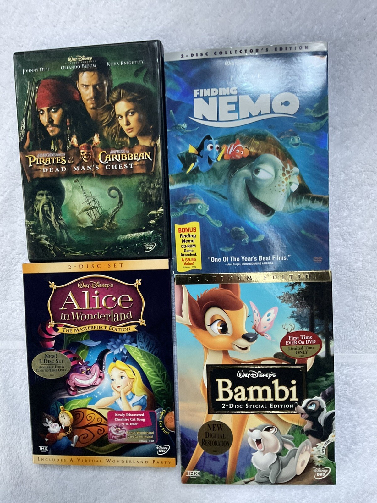 DVD Lot Of 4 Disney Greats, Pirates, Nemo, Alice In Wonderland, Bambi ...