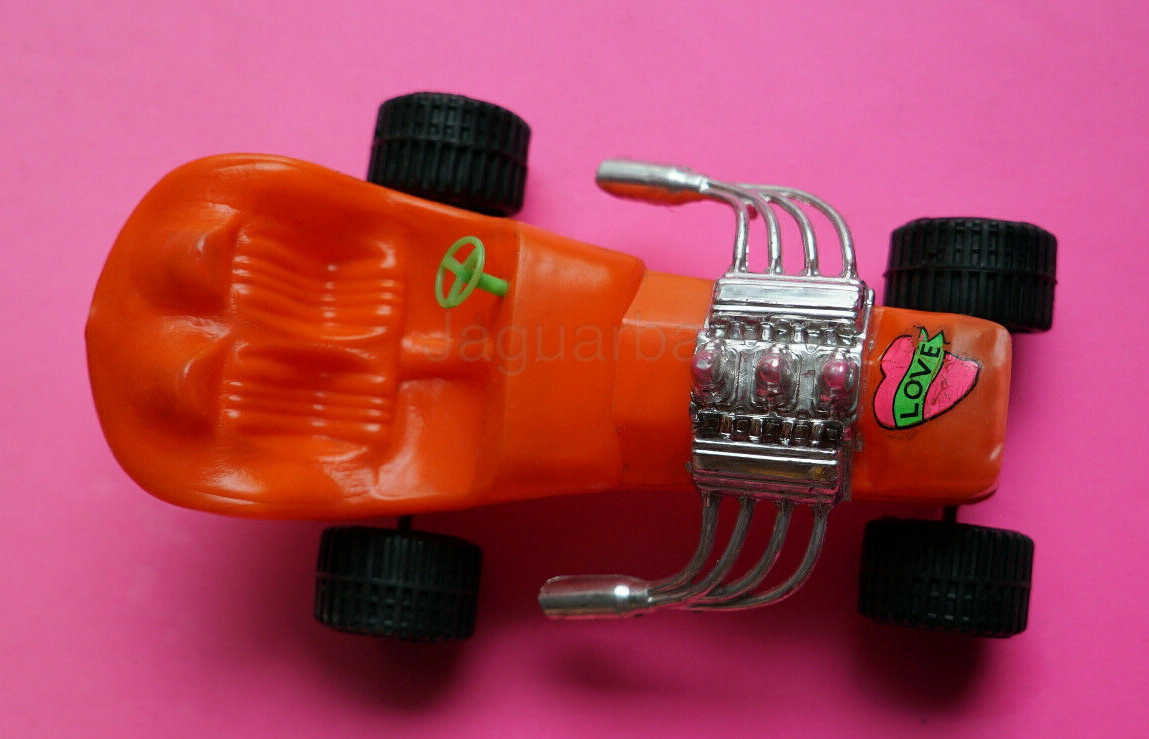 Mexican vintage plastic orange RACE CAR w/ GENERAL POPO STRIKER TIRES ...