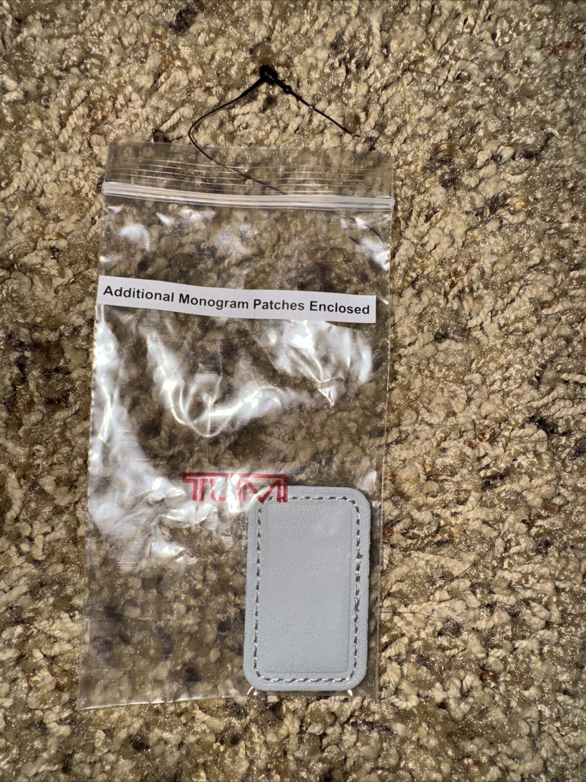 NEW in Bag Tumi Monogram Patch in Grey Leather | eBay