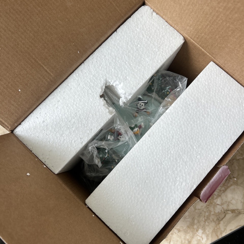 St Nicholas Square Christmas Village Disney Mickey & Friends Ice ...