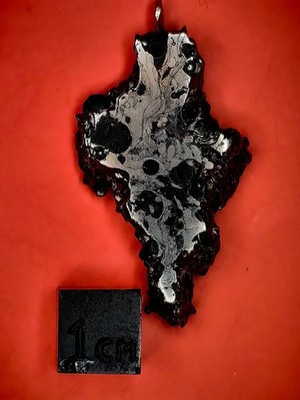 Meteorite.No, it's not a meteorite.It's pure, telluric, very rare earth ...