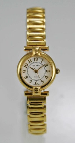 Sharp Watch Women Stainless Steel Gold Stretch Water Resist Battery ...