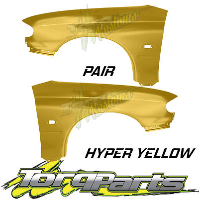 PAIR HYPER YELLOW GUARDS VT VX SUIT HOLDEN COMMODORE FENDER QUARTER ...