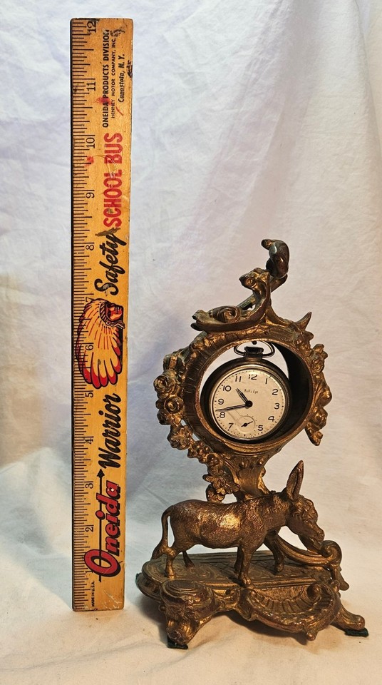 Antique Gilt Brass Watch Hutch along with a Running Bull's Eye Pocket ...