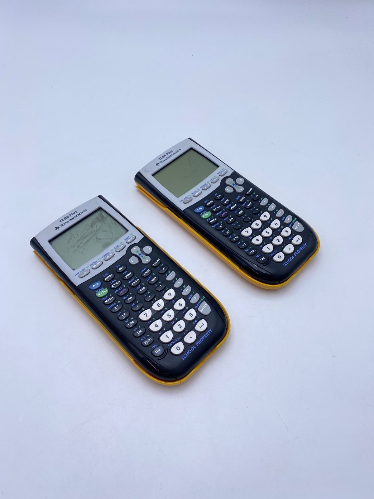 Lot of 2 – Texas Instruments TI-84 Plus Graphing Calculators (Yellow ...