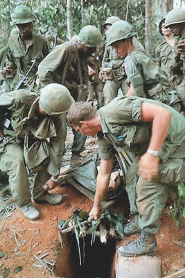 Vietnam War Photos -- US Soldiers Helping Wounded Soldier Out Of Tunnel ...