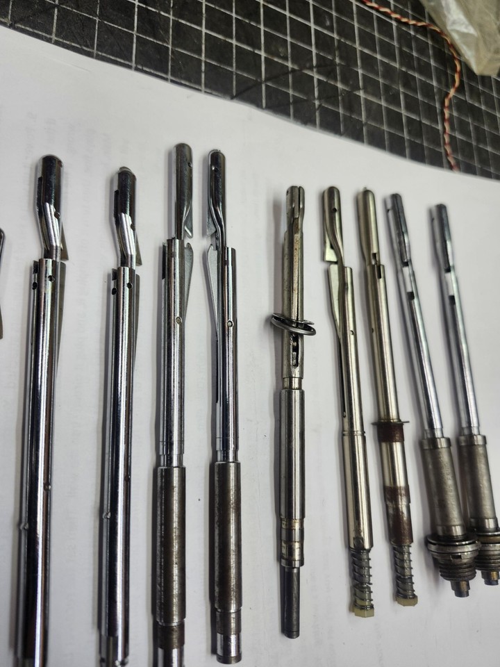 Eleven of the STACKING SPINDLES. DIFFERENT TYPES AND STYLES, BRAND ...