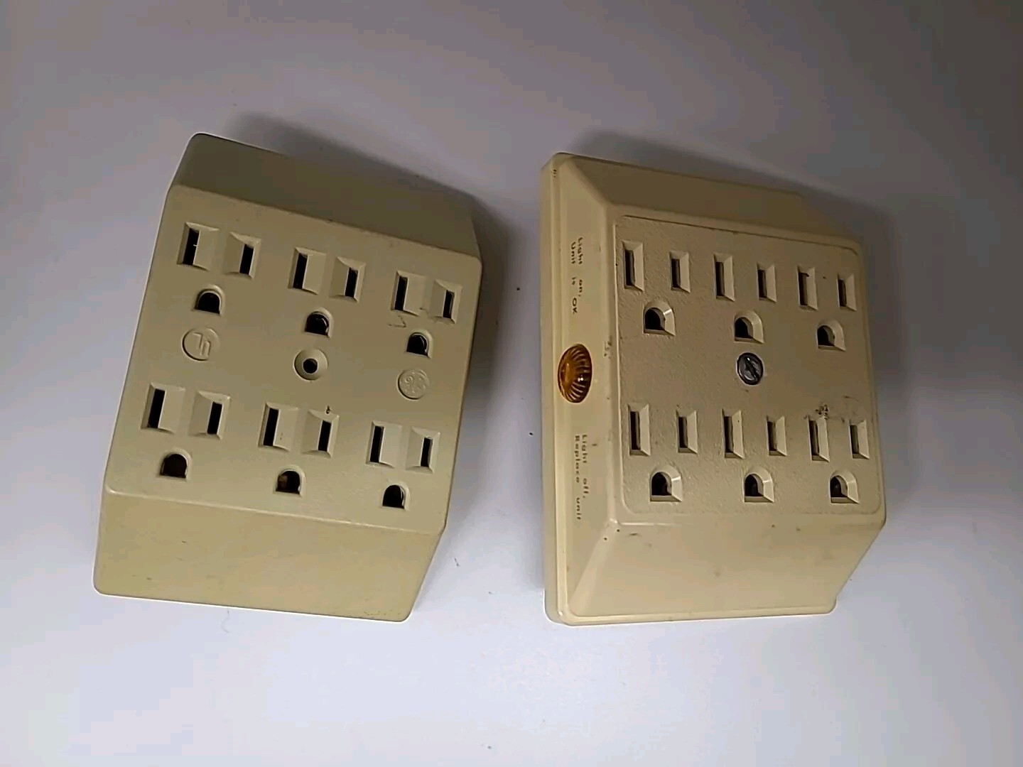Regular 6 outlet wall plug adapter and a Surge & Noise Suppressor 6 ...
