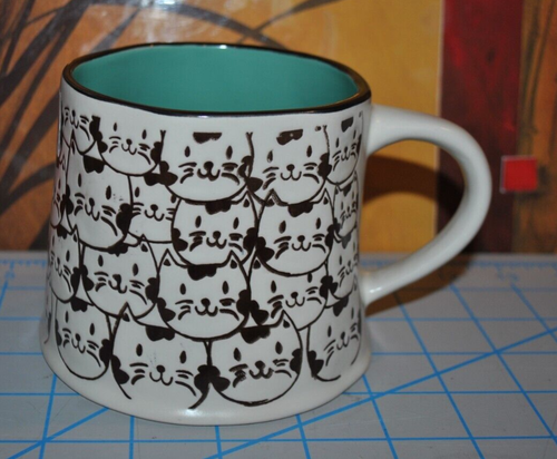 NEW SPECTRUM Designz MUG Halloween REPEAT BLACK CAT FACES Embossed Teal ...