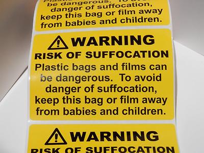 RISK OF SUFFOCATION Plastic Bag/Film, 125 warning labels/rl, yellow bkg ...