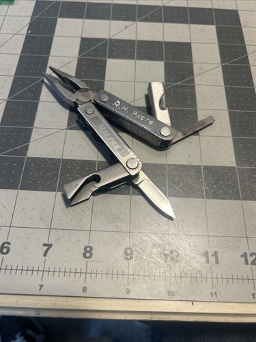 LEATHERMAN MINI-TOOL Collectible USA Rare Discontinued Branded/engraved ...