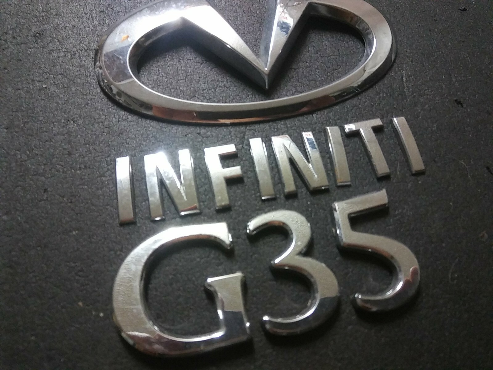 INFINITI G35 CHROME 2004 LETTERING EMBLEMS WITH TABBED LOGO | eBay