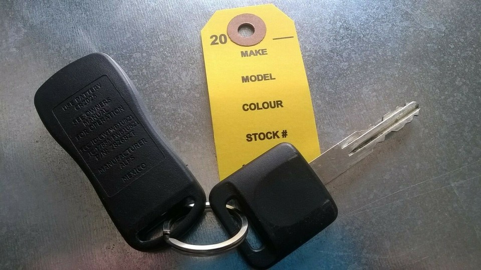 AUTOMOTIVE KEY TAG: 2-3/4" x 1-3/8" cardboard (2000) .... FREE SHIPPING ...